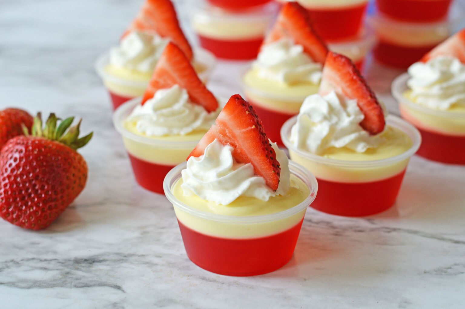 Strawberry Cheesecake Pudding Shots - Planning Inspired